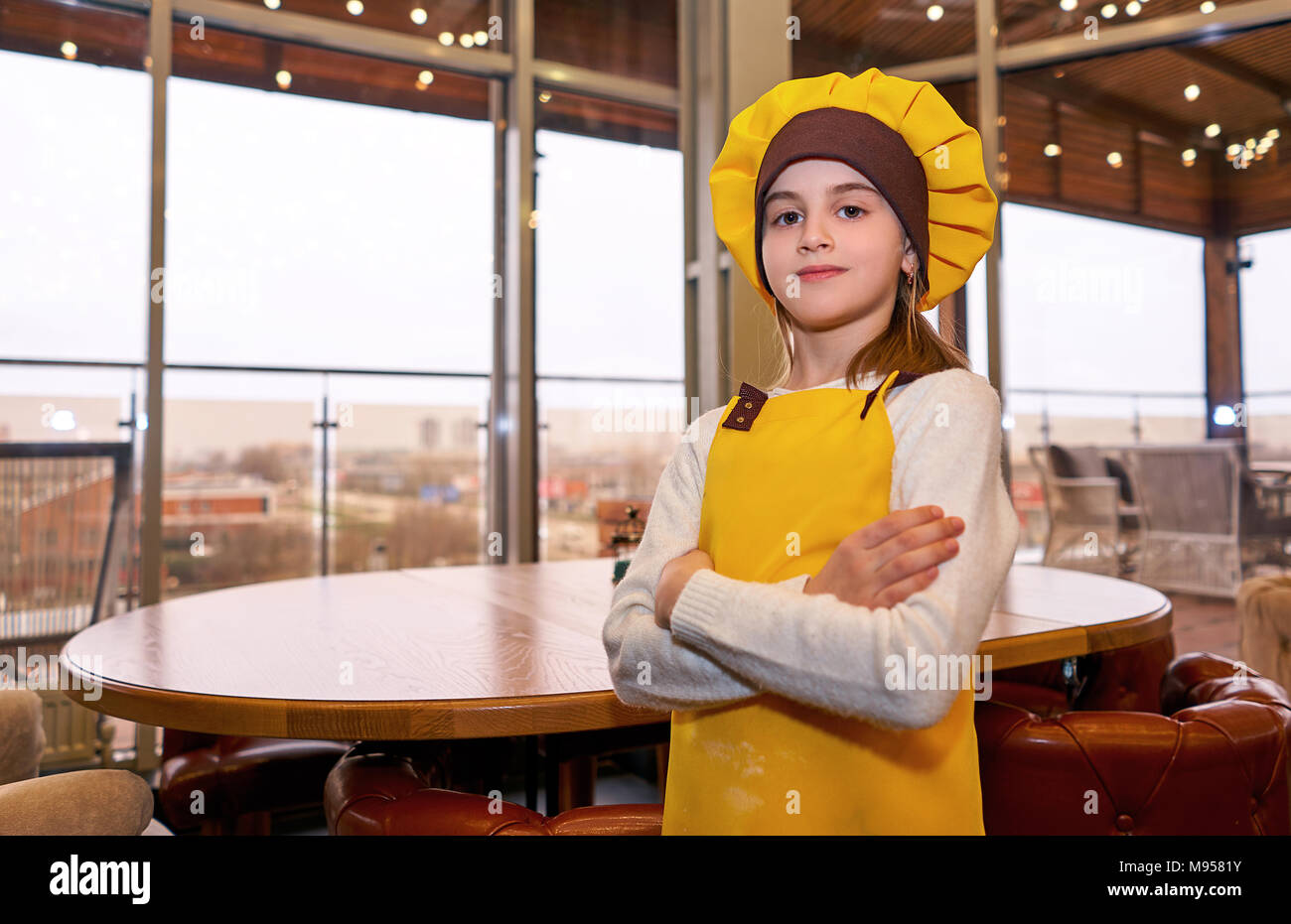 girl in the hood chef restaurant Stock Photo - Alamy