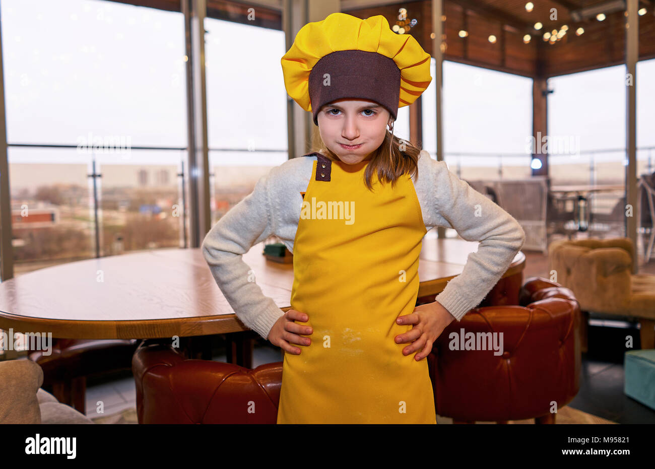 girl in the hood chef restaurant Stock Photo - Alamy