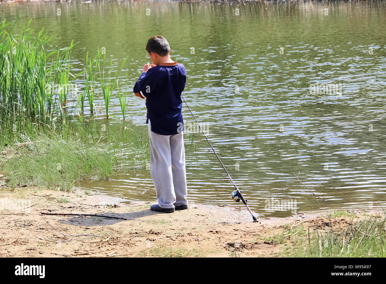 Holding setting hook hi-res stock photography and images - Alamy