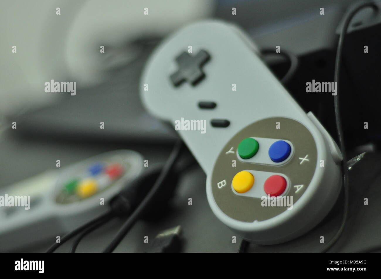 Nostalgic gaming controllers Stock Photo - Alamy