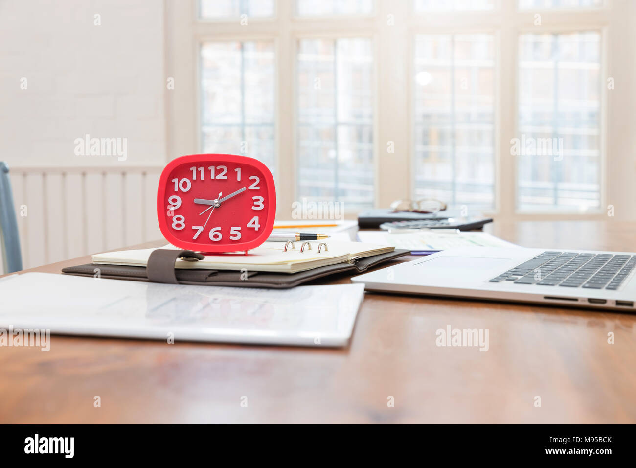 Business and finance concept of office working,Closeup Clock on office ...