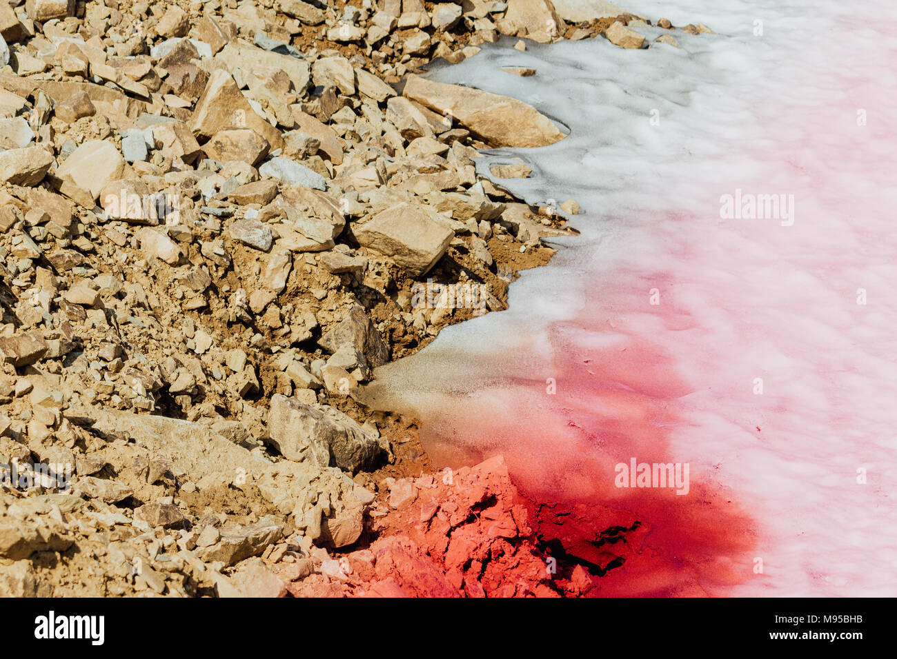 The incident in the mountains. Traces of blood on the snow and stones ...