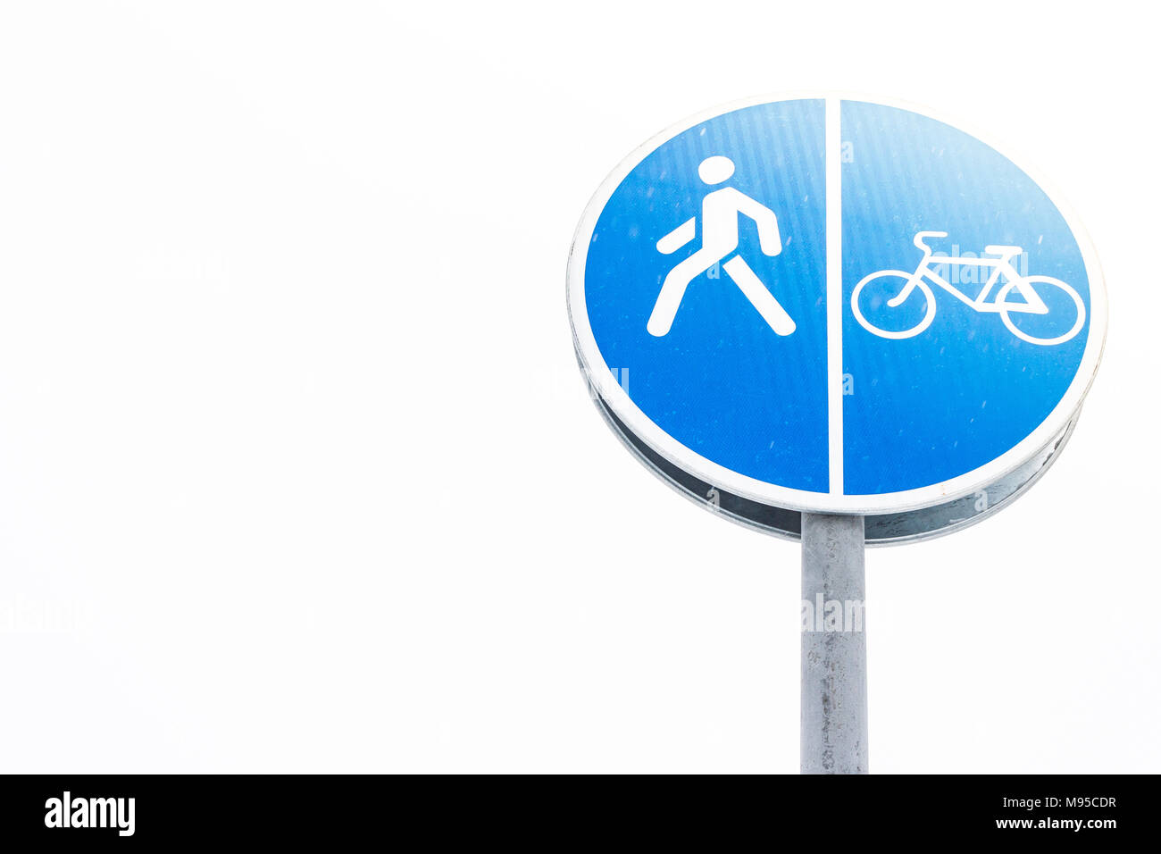 Blue Bicycle track sign on white background Stock Photo - Alamy