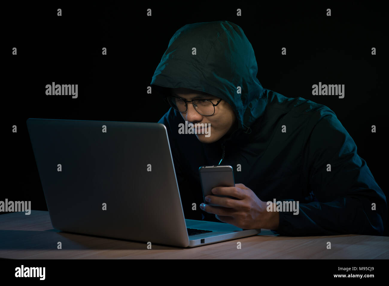 Hacker mobile phone using hi-res stock photography and images - Alamy