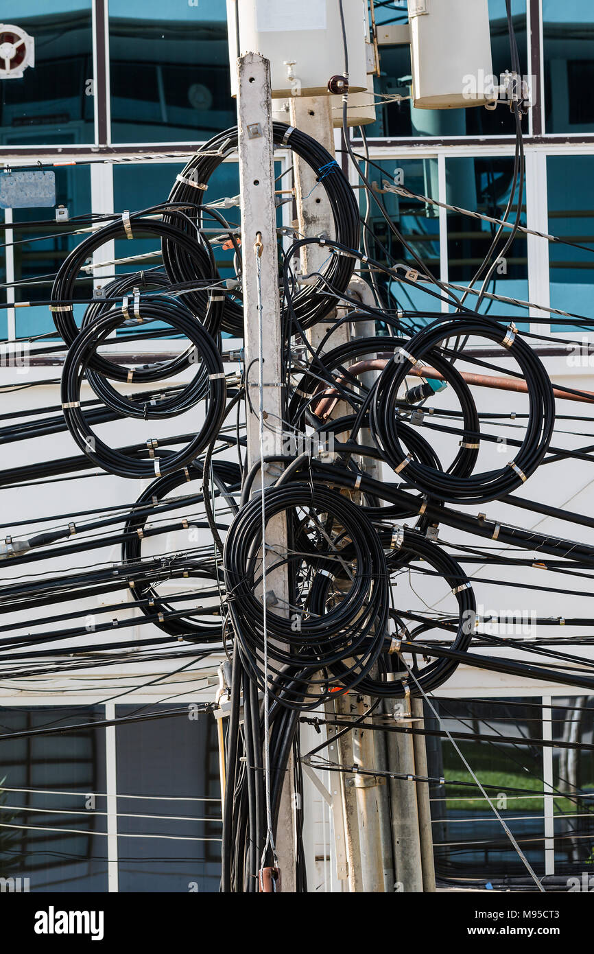 Chaos of cables and wires Stock Photo - Alamy