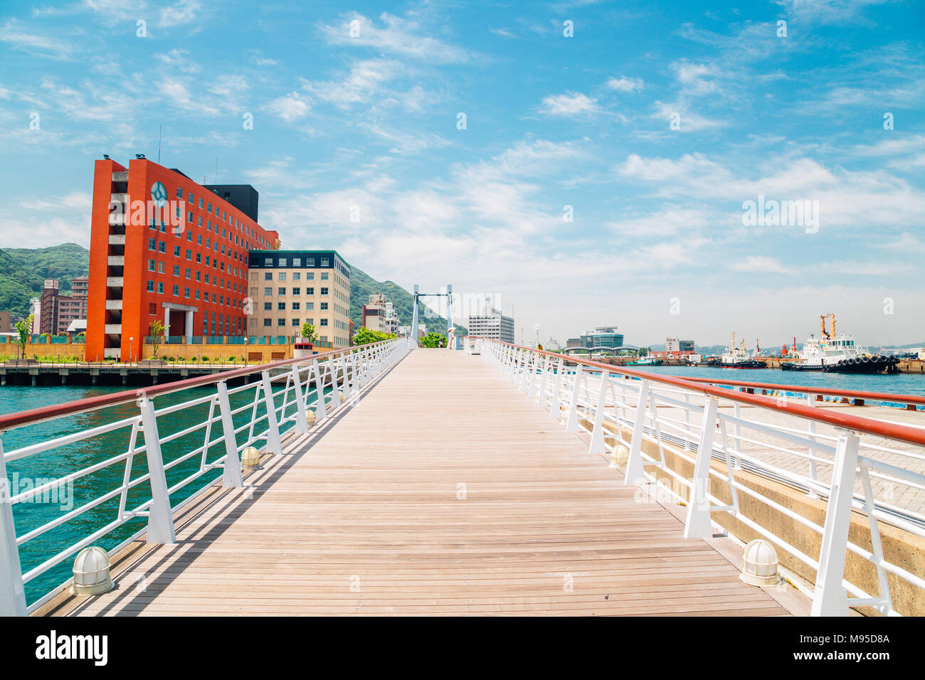 Blue wing moji bridge and sea in Mojiko retro town, Japan Stock Photo ...
