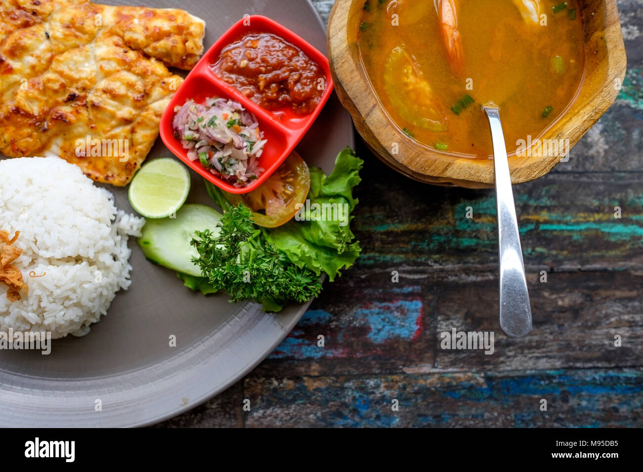 Top view of grilled barracuda with rice and vegetables. Healthy food ...