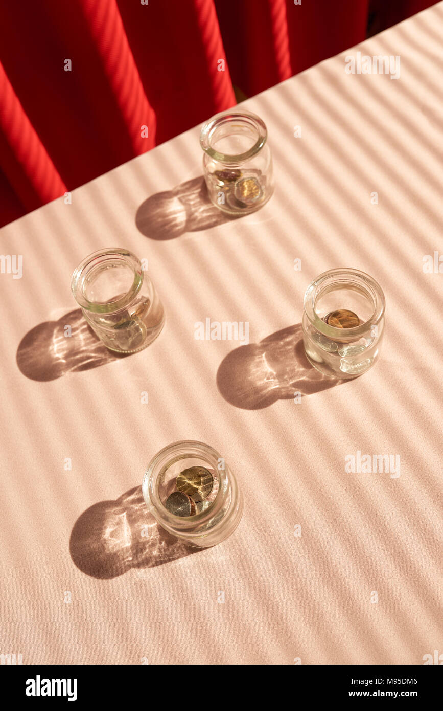 Coins in glass bottle color hi-res stock photography and images - Alamy