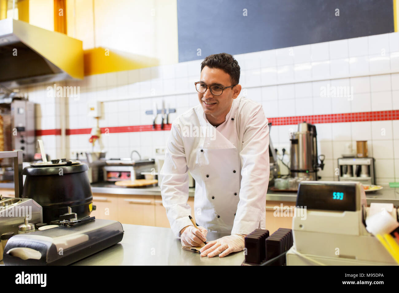 happy chef at kebab shop or fast food restaurant Stock Photo - Alamy