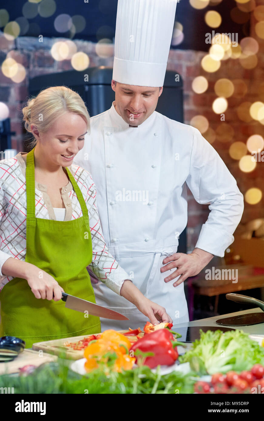happy male chef cook with woman cooking in kitchen Stock Photo - Alamy