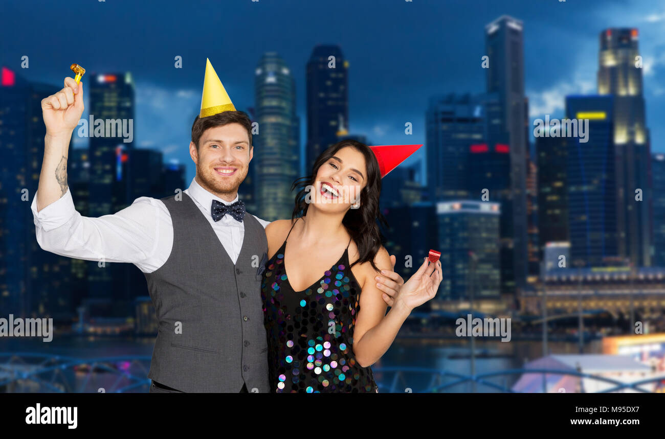 happy couple party in night singapore city Stock Photo - Alamy