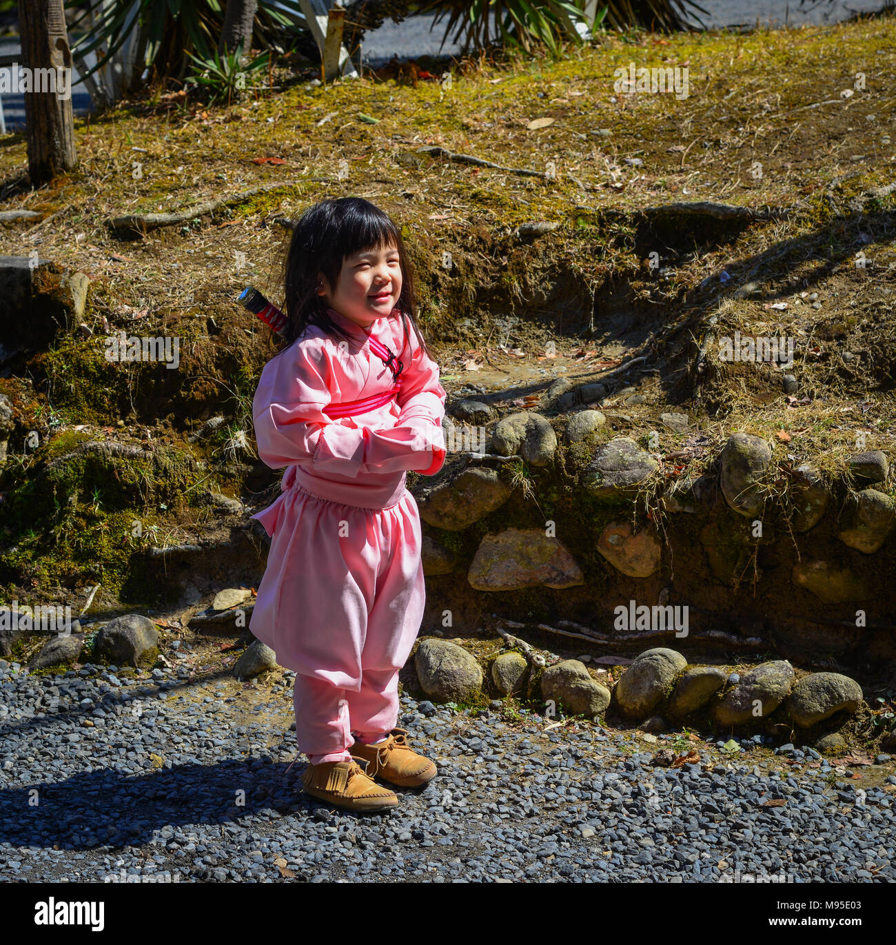 Iga City, Japan - Mar 17, 2018. A little girl wearing Ninja costume and ...