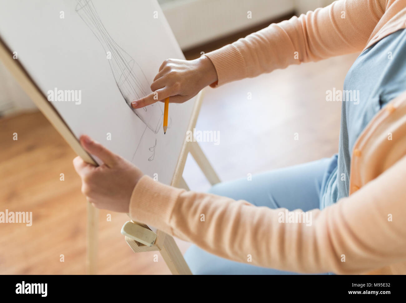 artist with pencil drawing picture at art studio Stock Photo - Alamy