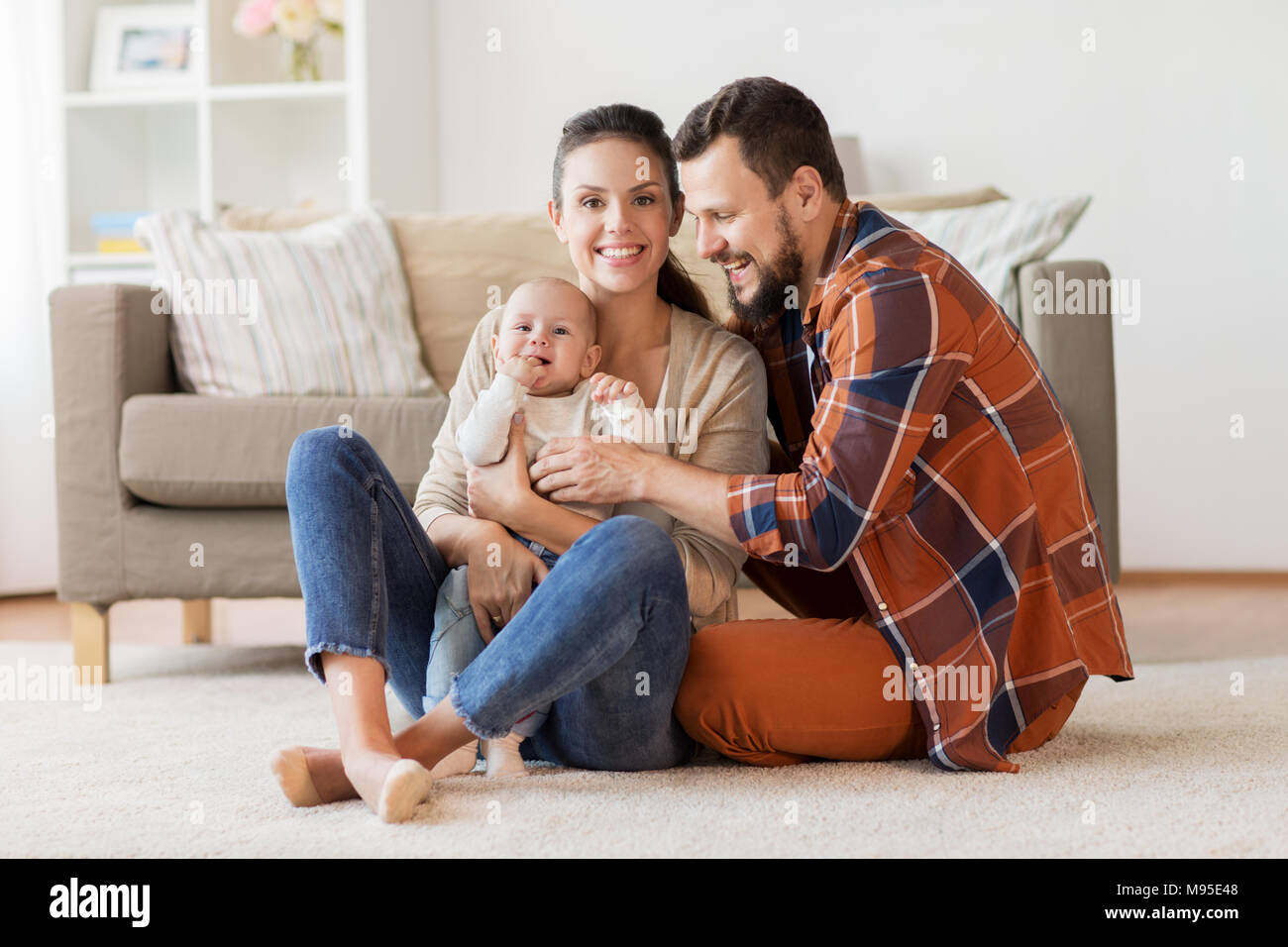 happy family with baby at home Stock Photo - Alamy