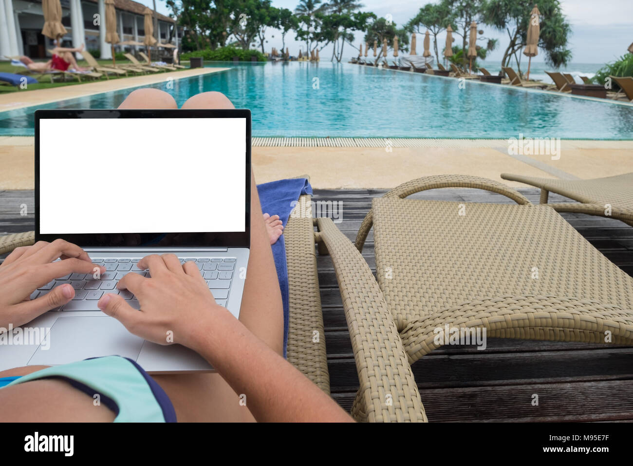 Recreational entrepreneur. Woman with laptop working during vacation ...