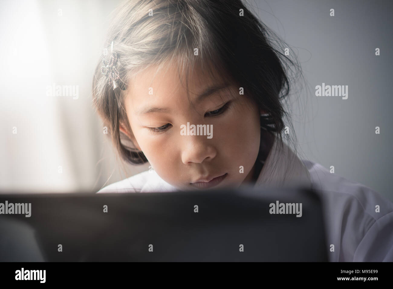Asian girl using laptop studying hi-res stock photography and images ...