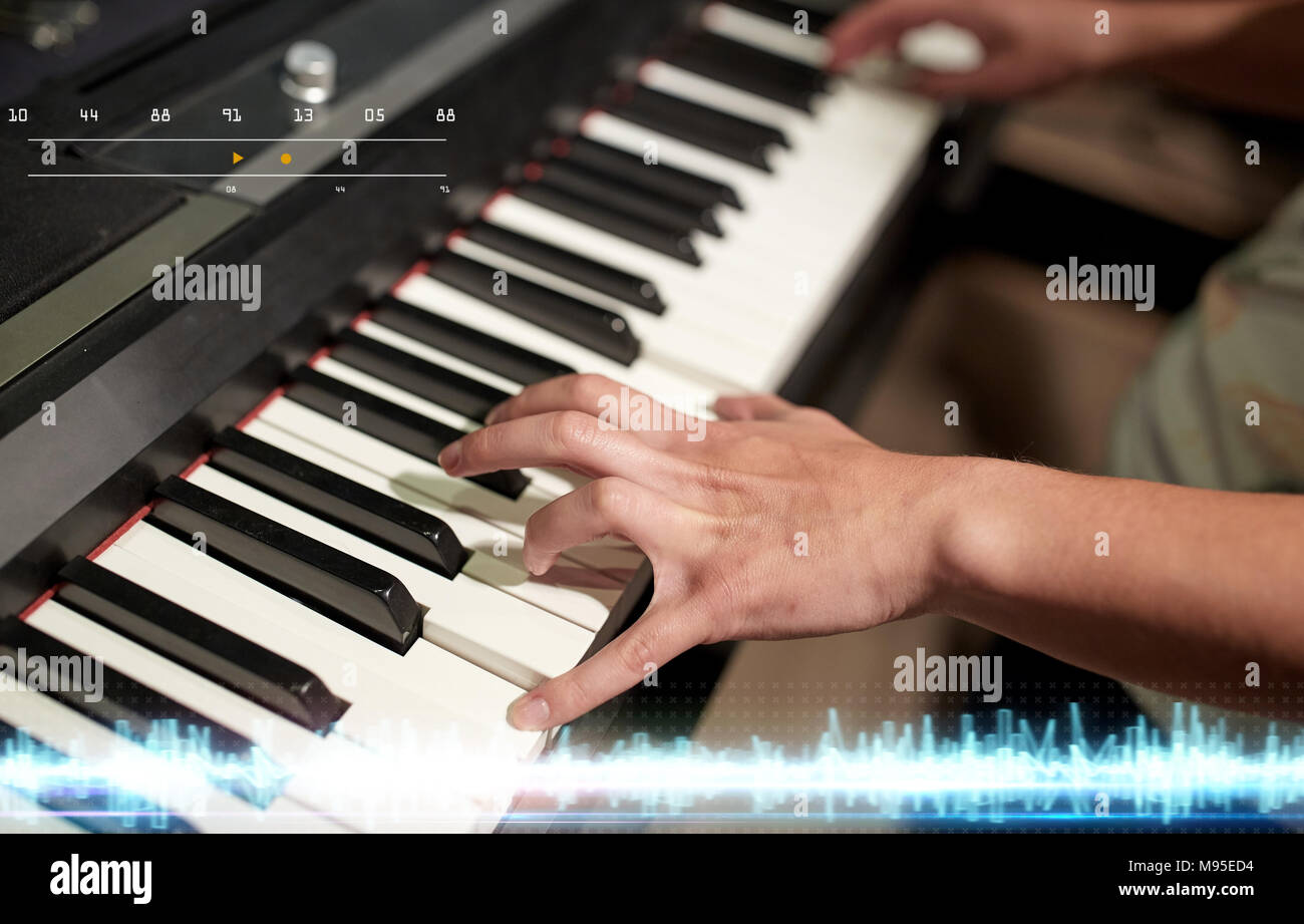 hands playing piano at sound recording studio Stock Photo - Alamy