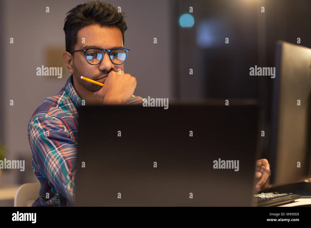 Closeup man working late night hi-res stock photography and images - Alamy