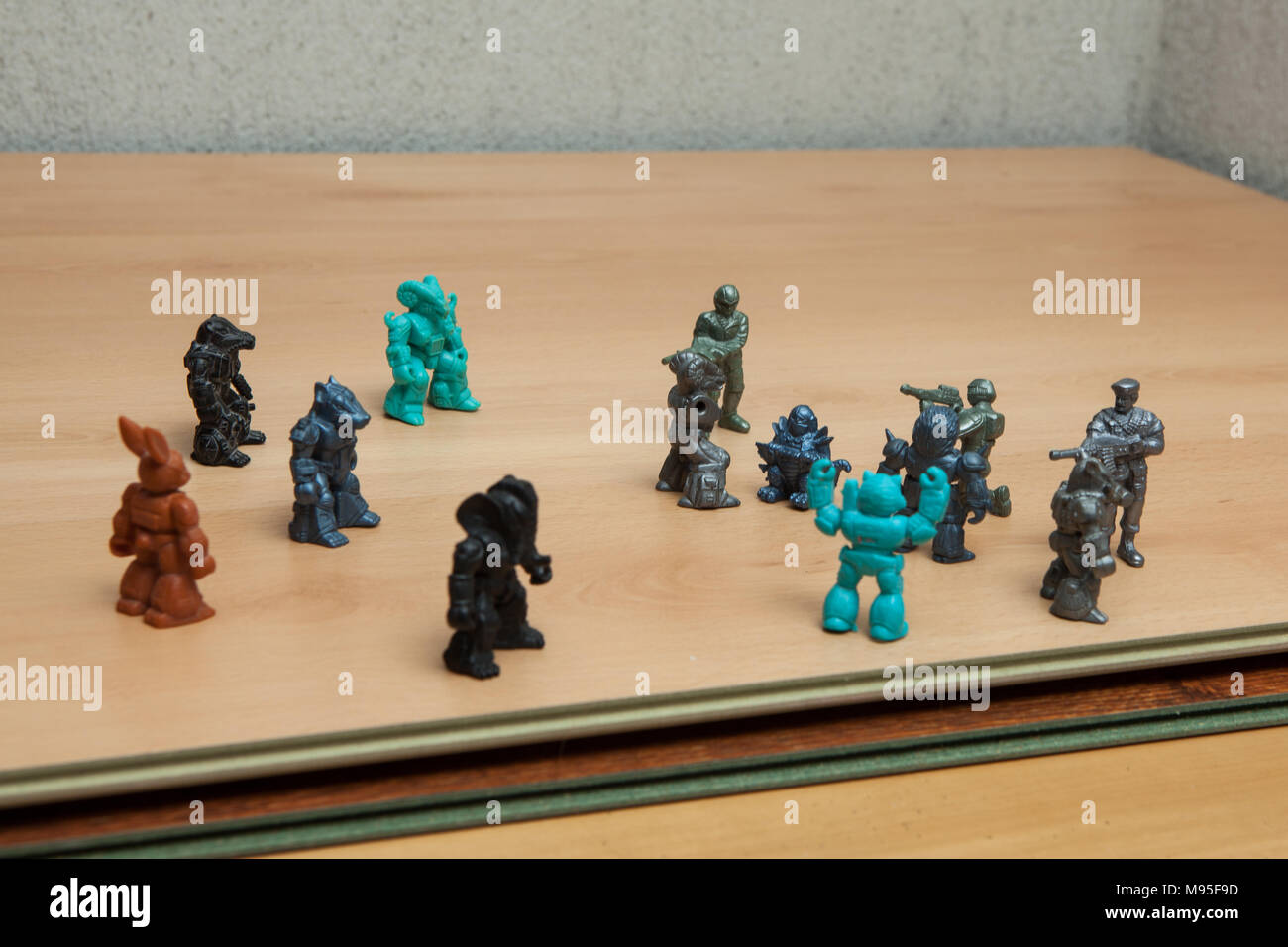 Soldiers games toys on wooden floor Stock Photo - Alamy