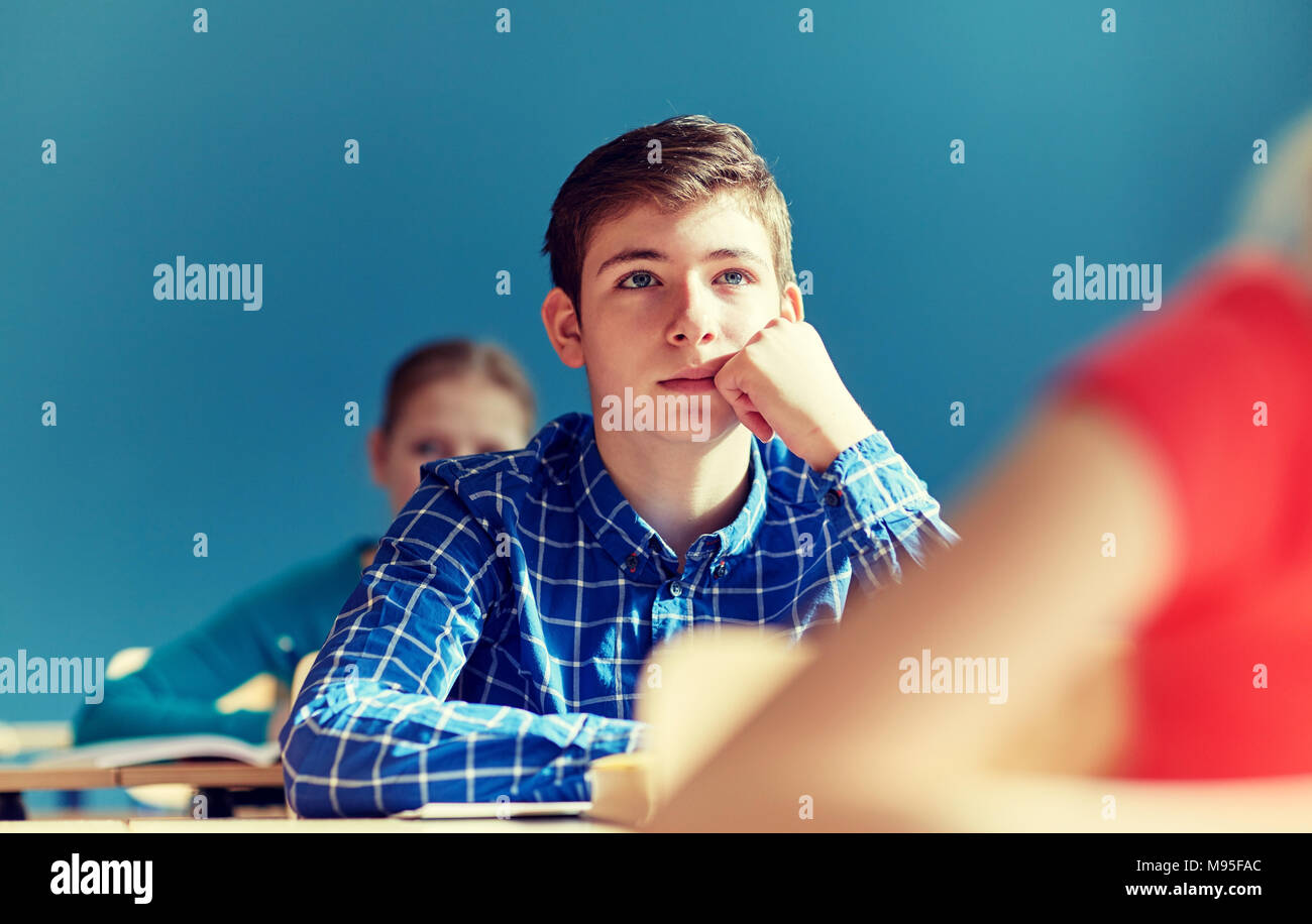 group of students with notebooks at school lesson Stock Photo - Alamy