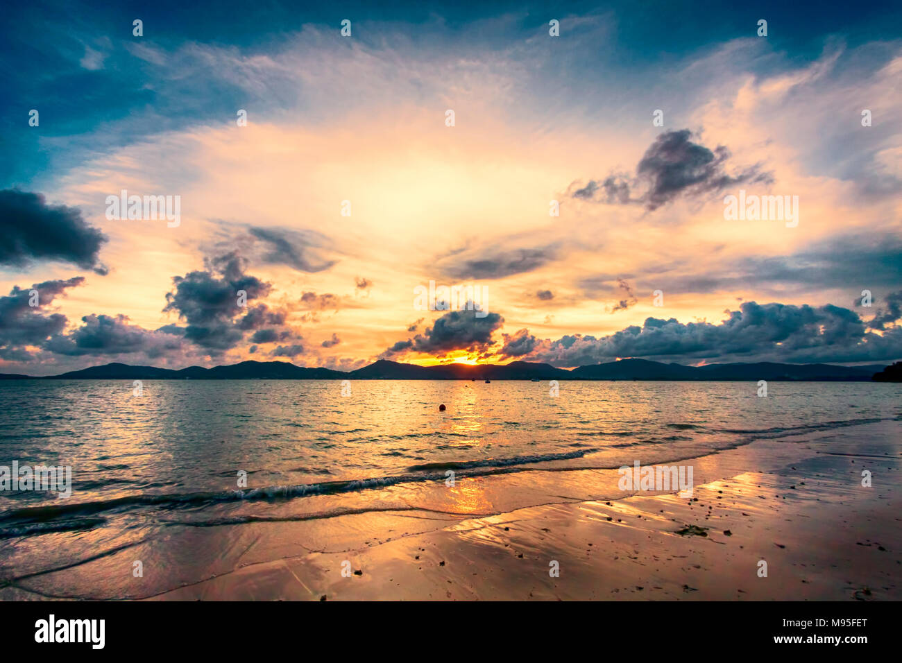 Thai seascape sunset in front of Puket Stock Photo - Alamy