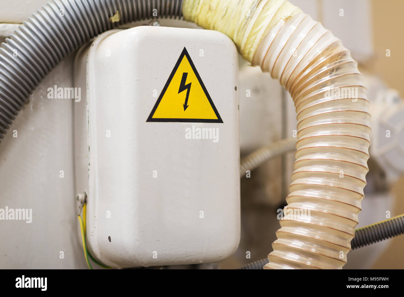 electric panel with caution sign Stock Photo - Alamy