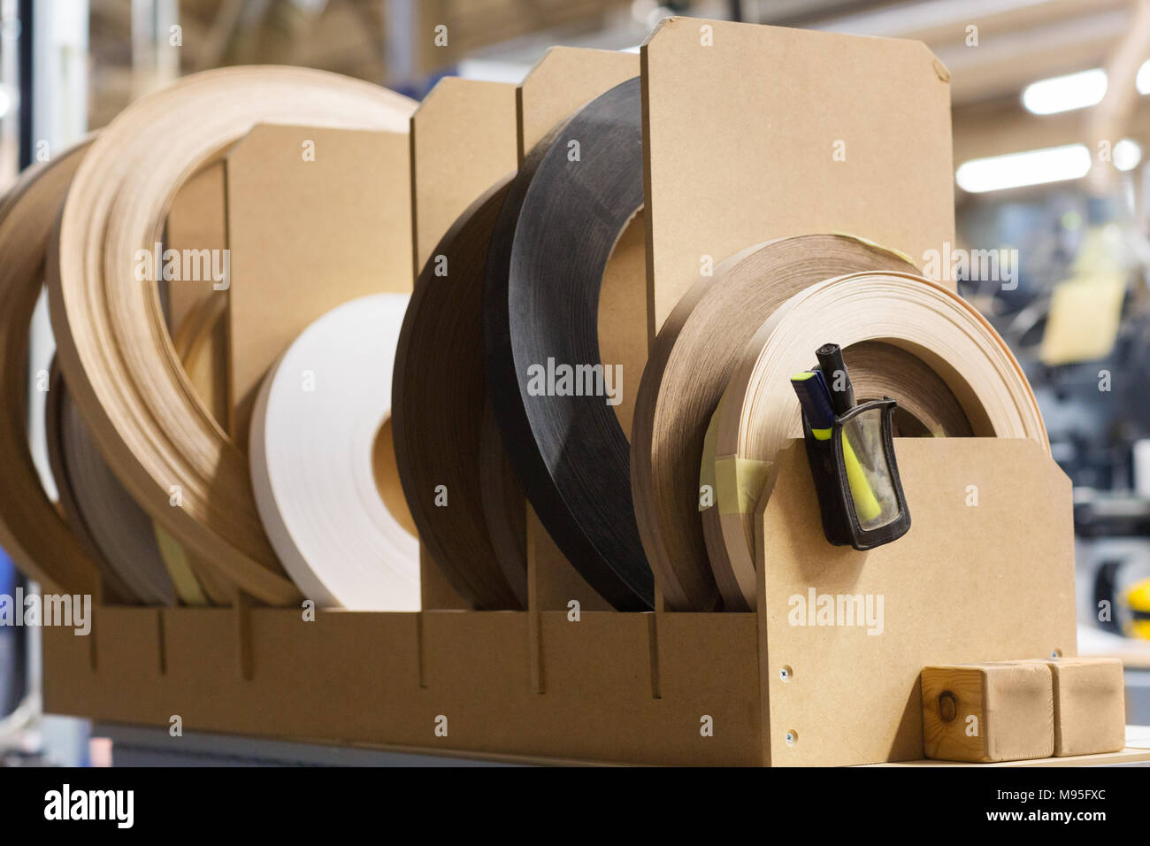 veneer or edge band tapes at woodworking factory Stock Photo - Alamy