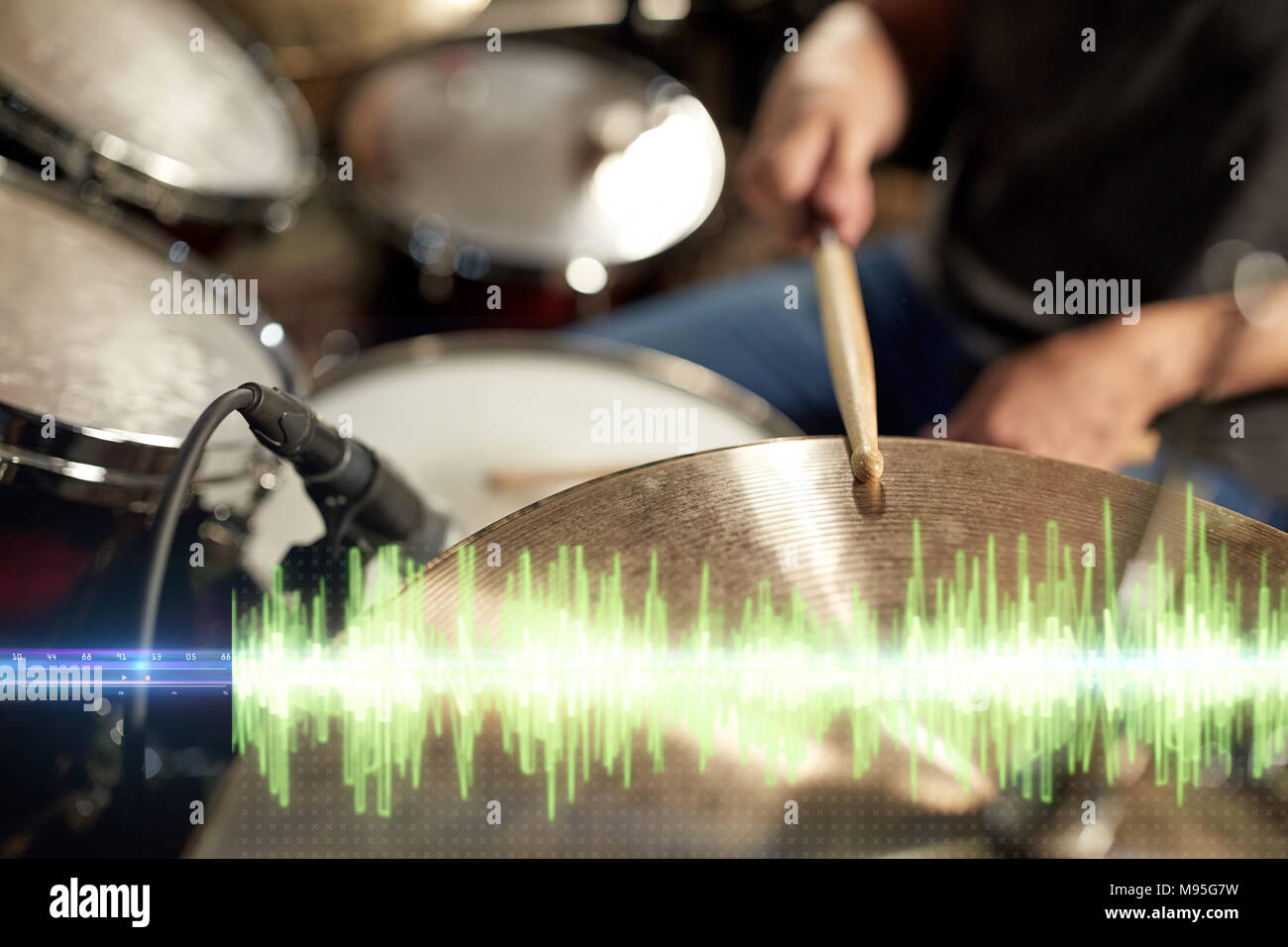drummer playing drum kit at sound recording studio Stock Photo - Alamy