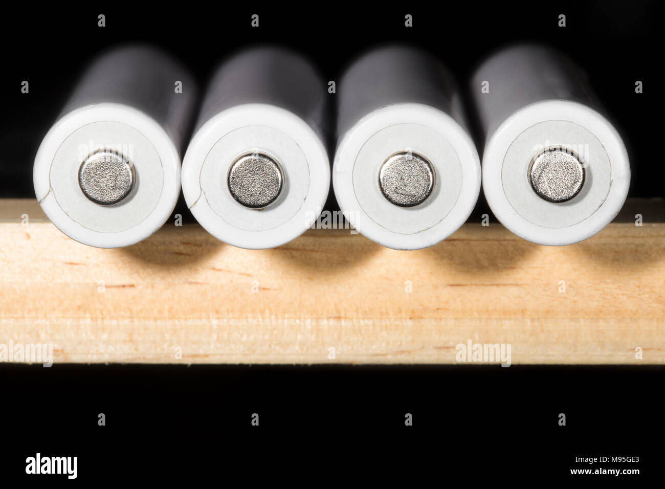 white batteries on the board, background image with space for text ...