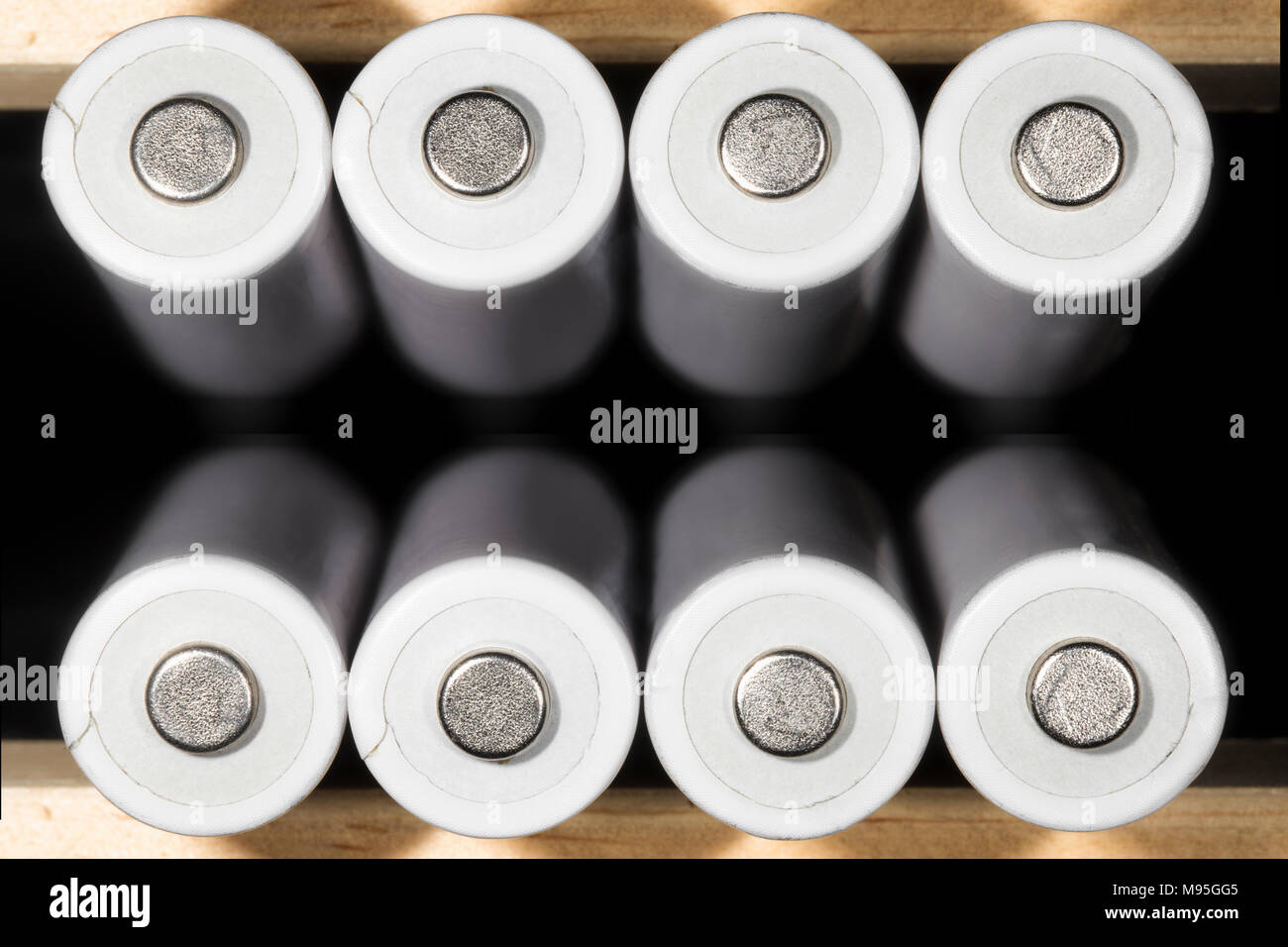 white batteries on the board, background image with space for text ...