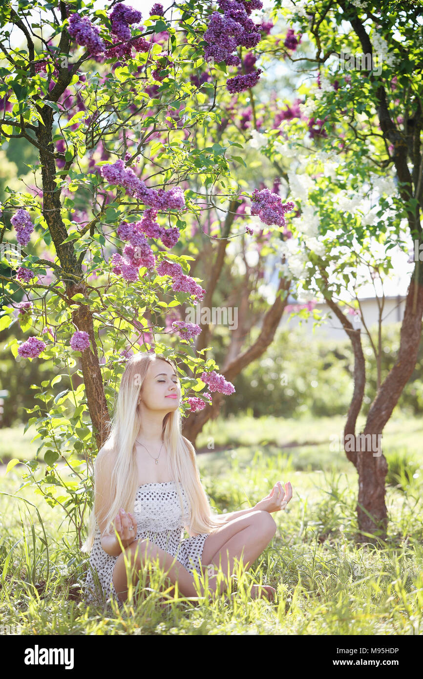 Woman in the lotus position Stock Photo - Alamy