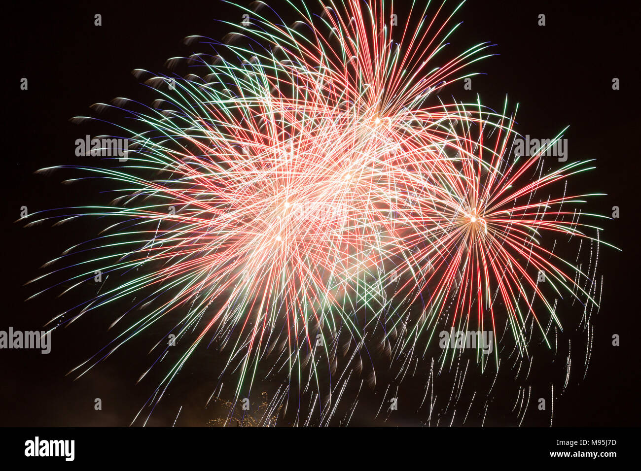 Beautiful fireworks on night sky Stock Photo - Alamy