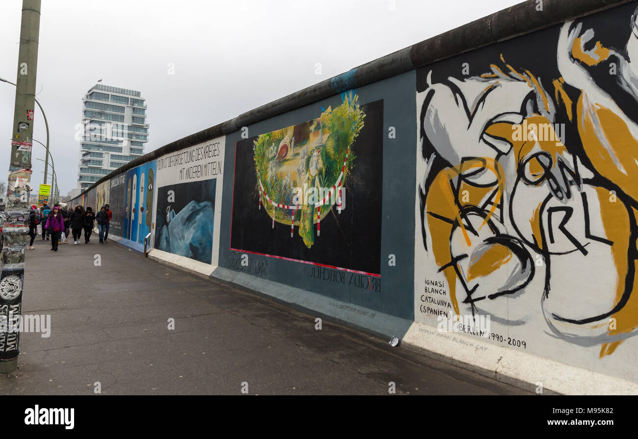 BERLIN, GERMANY - DECEMBER 16, 2017: Mural painted over Berlin Wall in ...