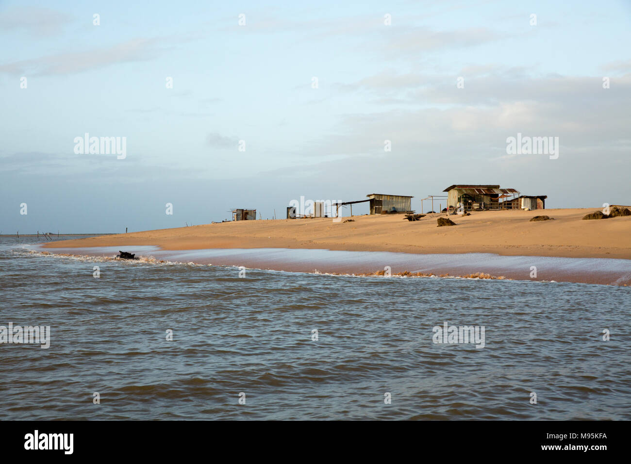 Beach huts near Matapica beach, Suriname, a famous area for several ...