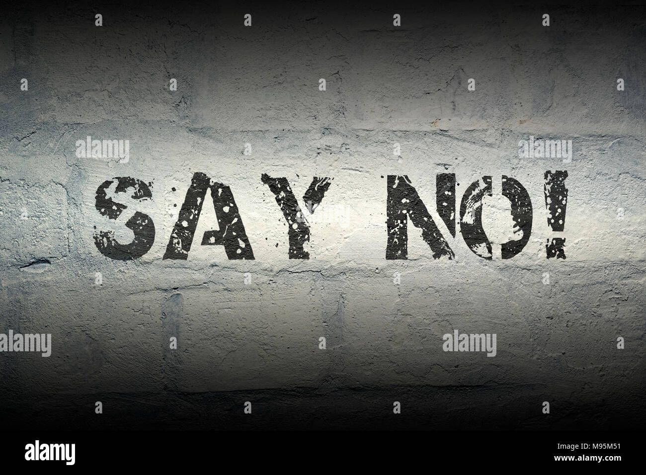 say no exclamation stencil print on the grunge white brick wall Stock ...