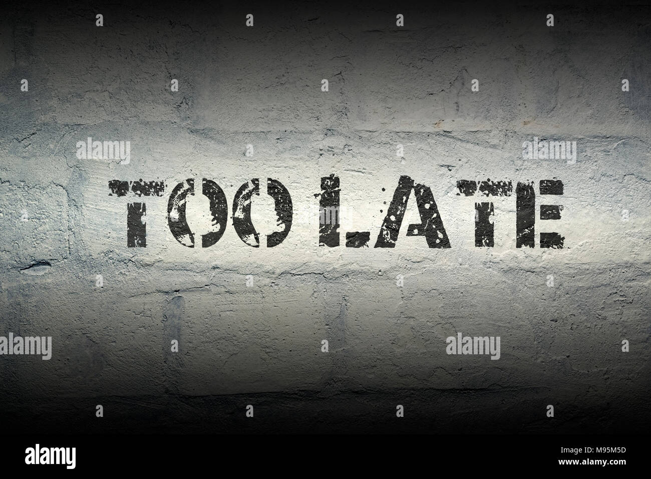 too late stencil print on the grunge white brick wall Stock Photo - Alamy