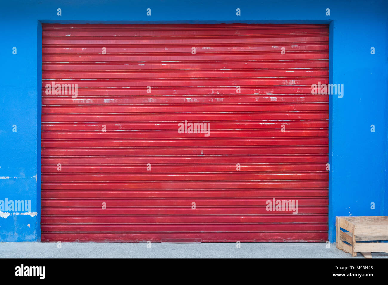 shutter background - shop exterior with closed red shutter Stock Photo ...