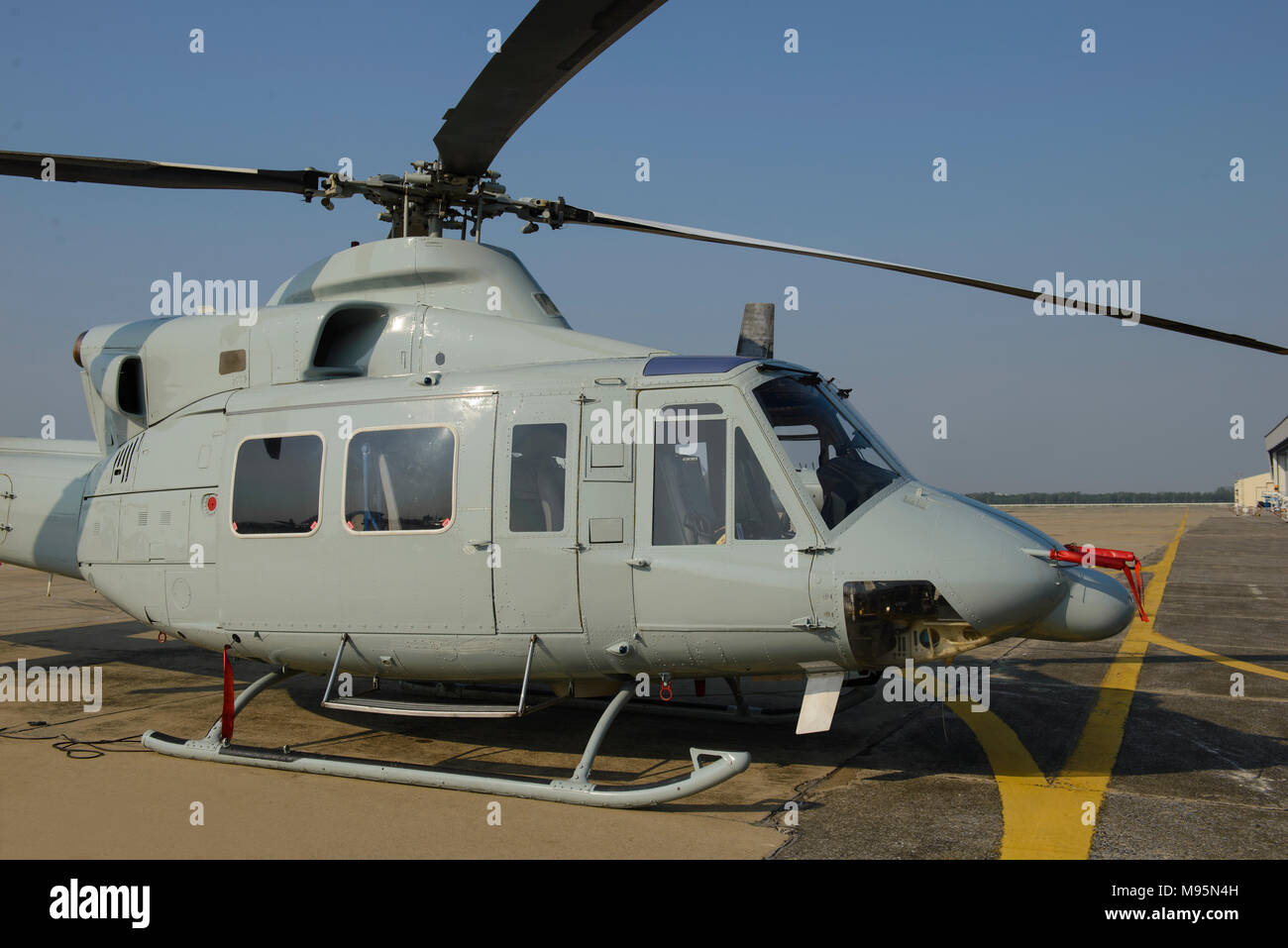 Military helicopter parked at homebase Stock Photo - Alamy