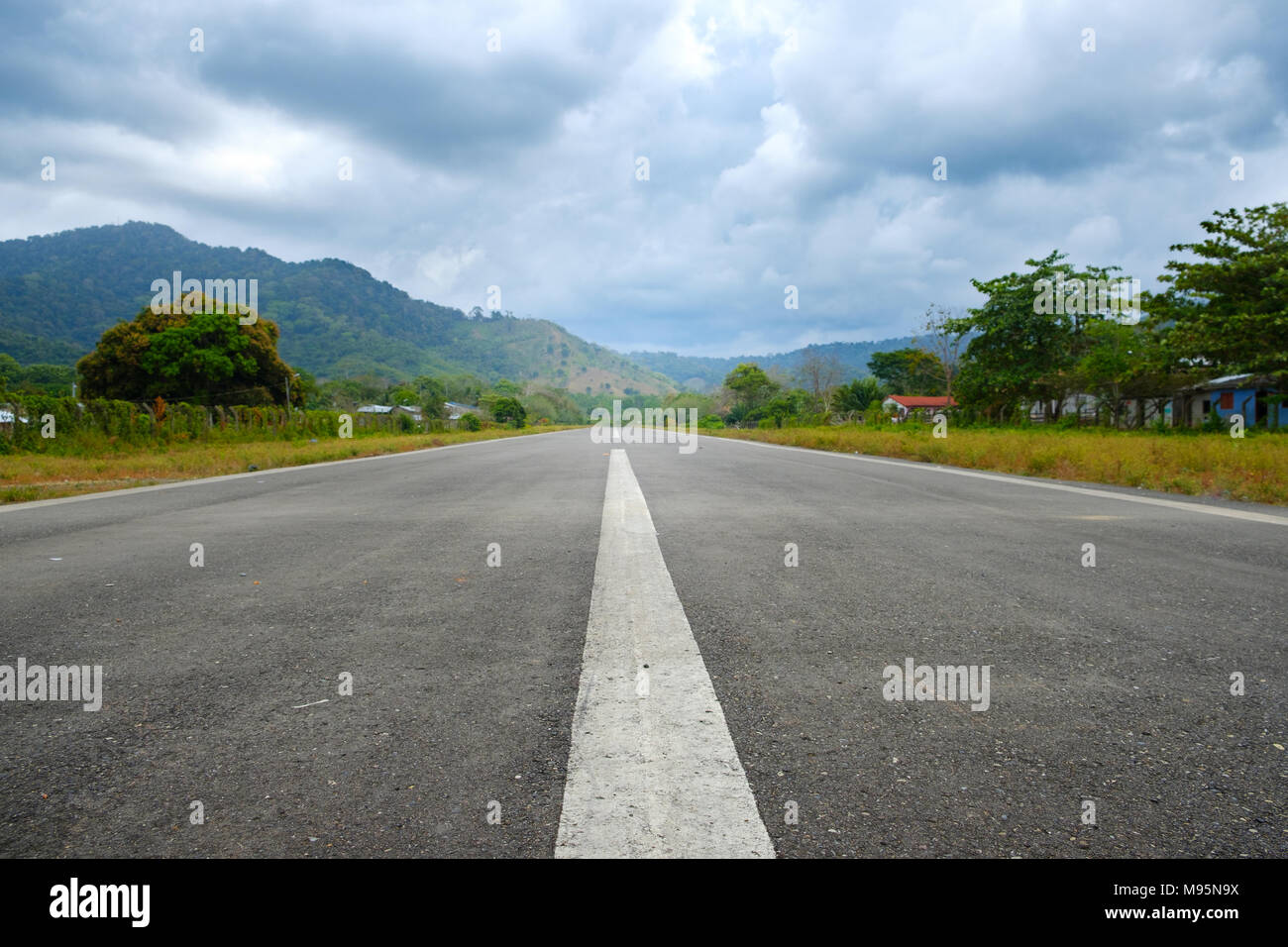 straight asphalt road in rural landscape - empty runway Stock Photo - Alamy