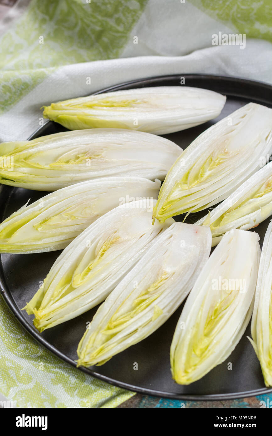 Fresh raw Belgian bitter chicory salad ready to cook, close up Stock ...