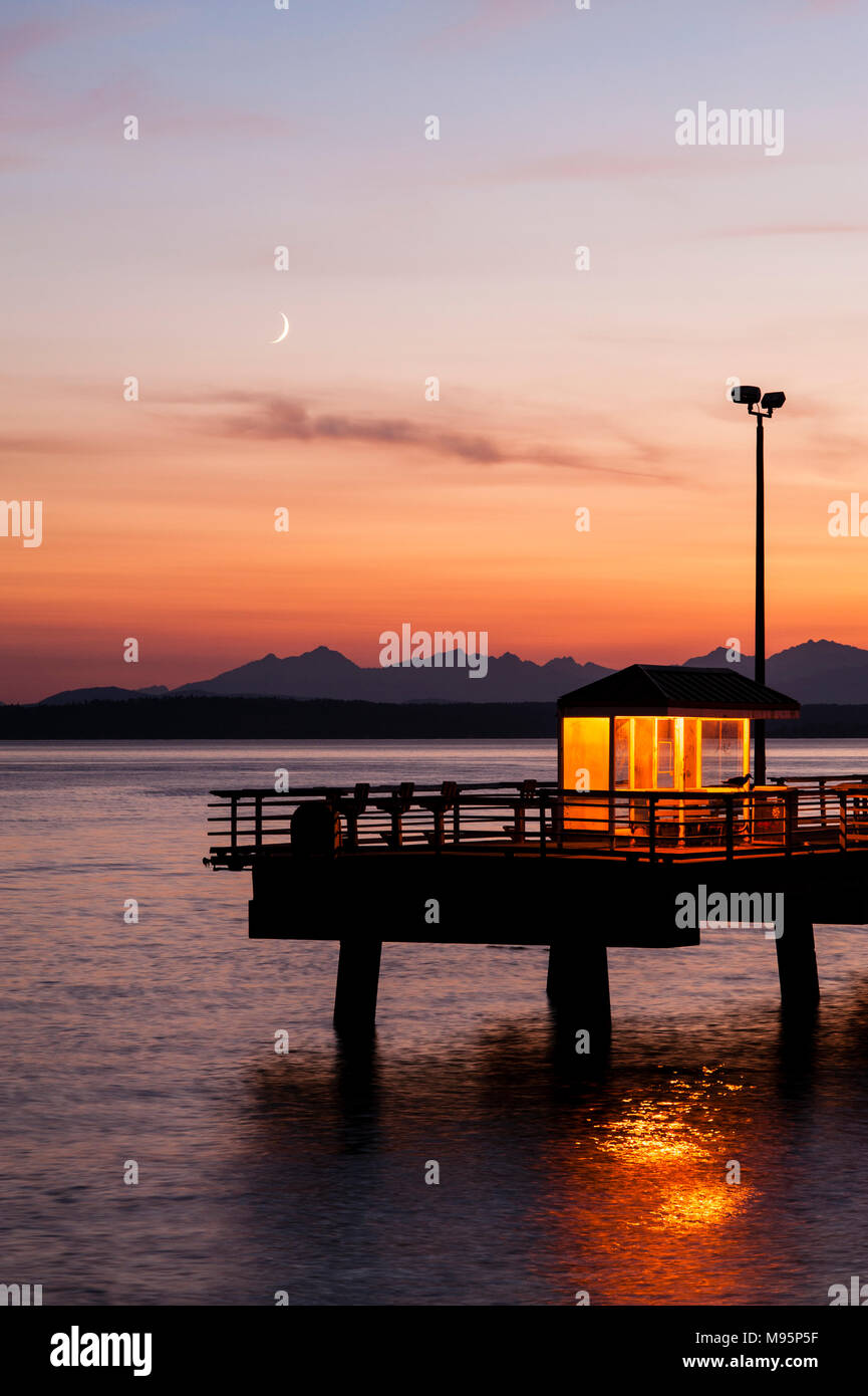 Fishing Pier on Elliott Bay with crescent moon and Olympic Mountains ...
