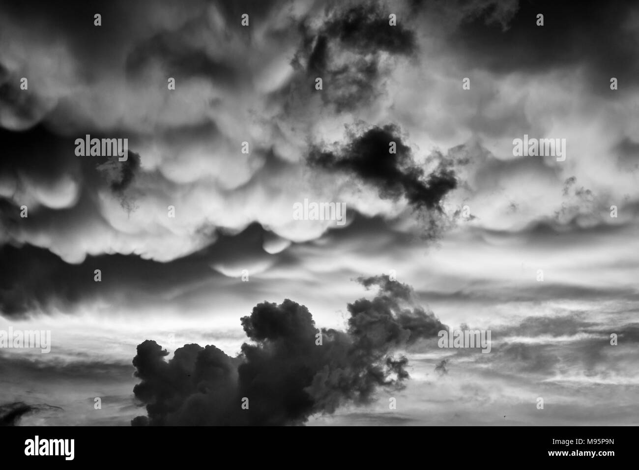 Setting sun clouds Black and White Stock Photos & Images - Alamy