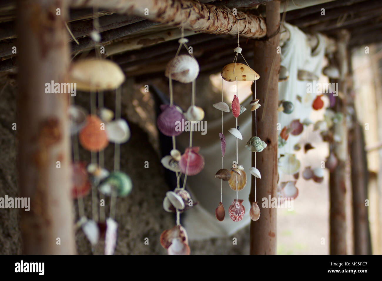 Multi colored wind chimes hi-res stock photography and images - Alamy