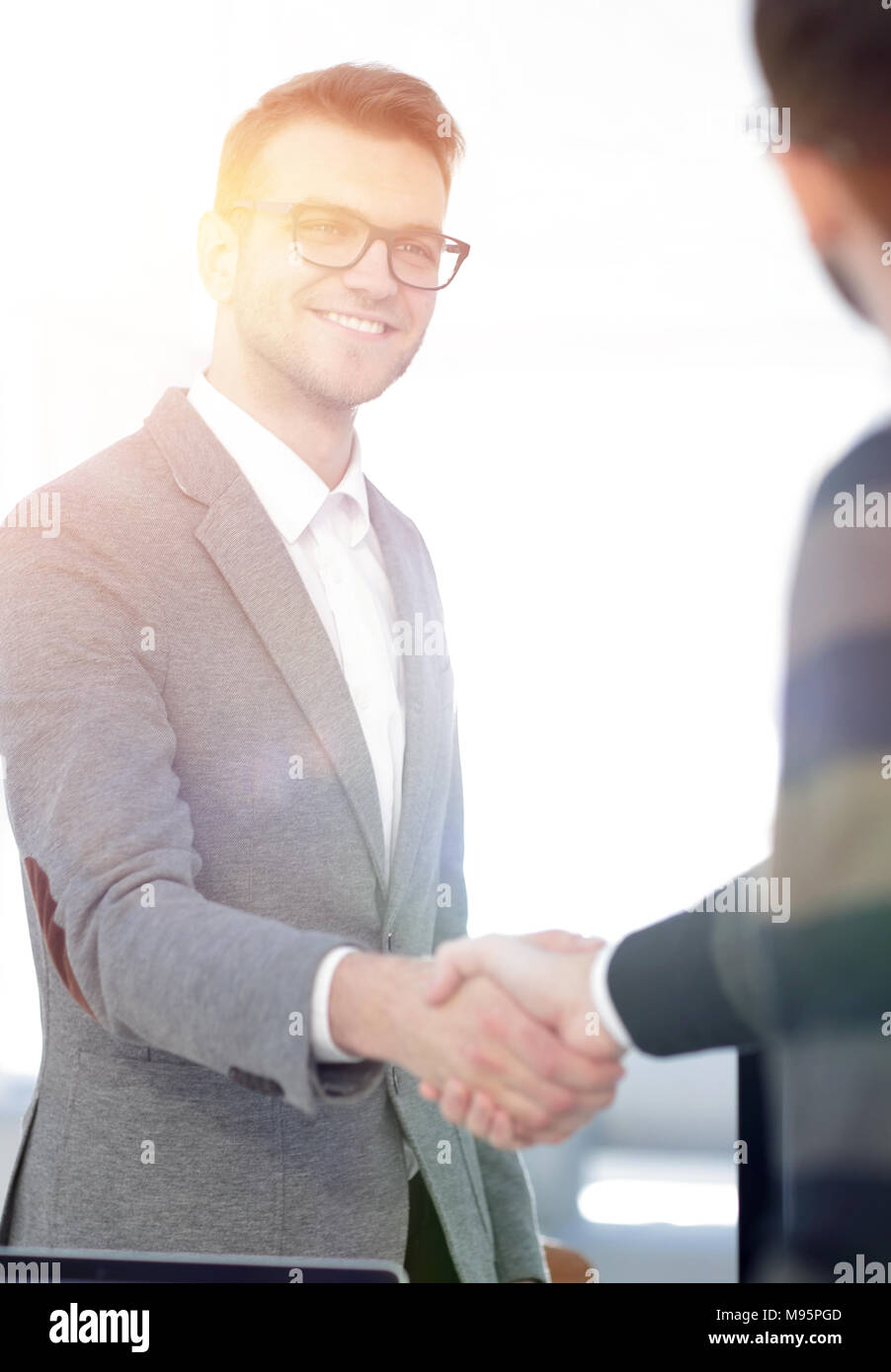 Bank worker congratulating couple hi-res stock photography and images ...