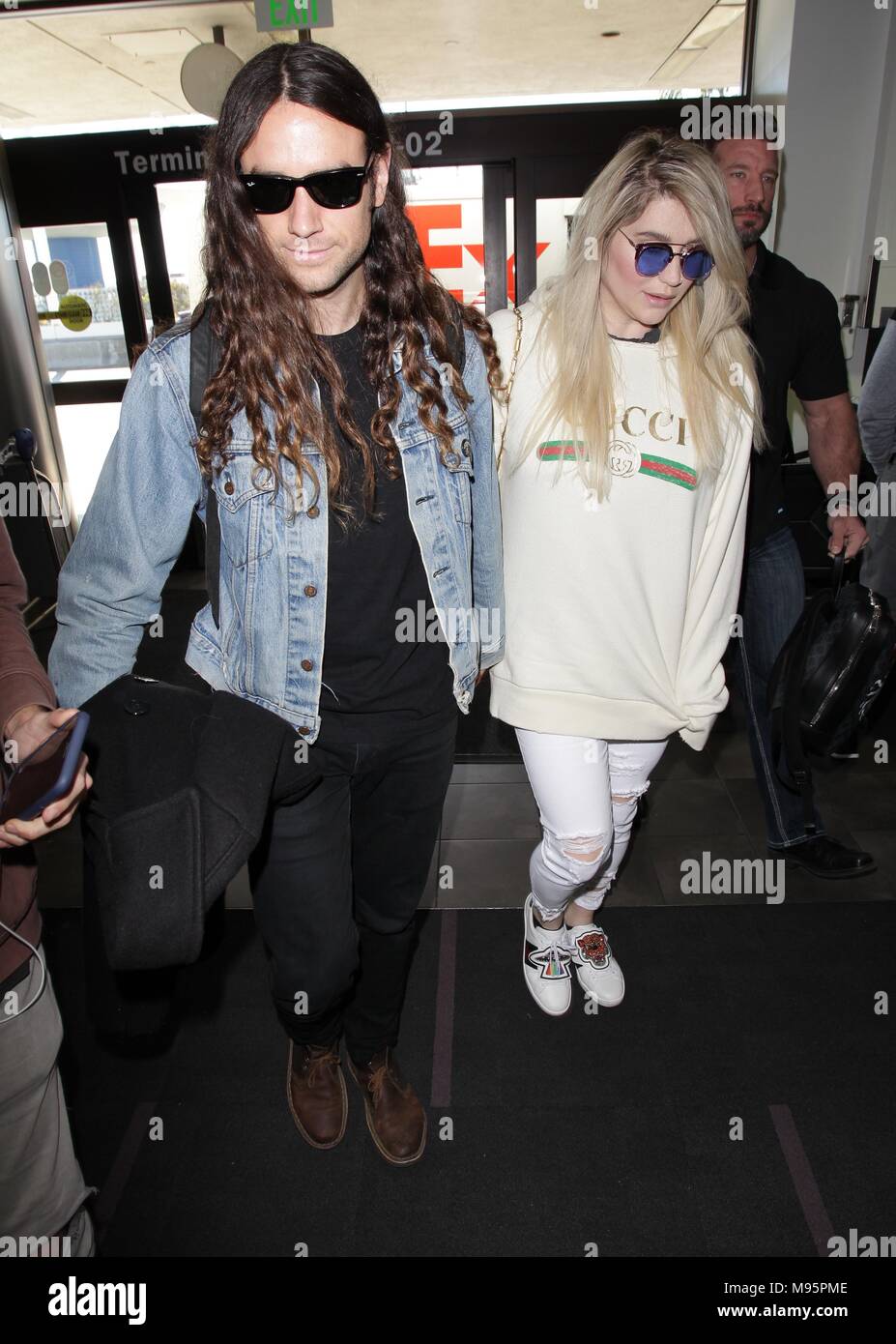 Kesha departs from Los Angeles International Airport (LAX) with her ...