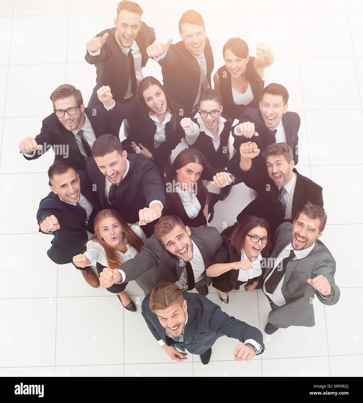 Triumphant team group businesspeople hi-res stock photography and ...