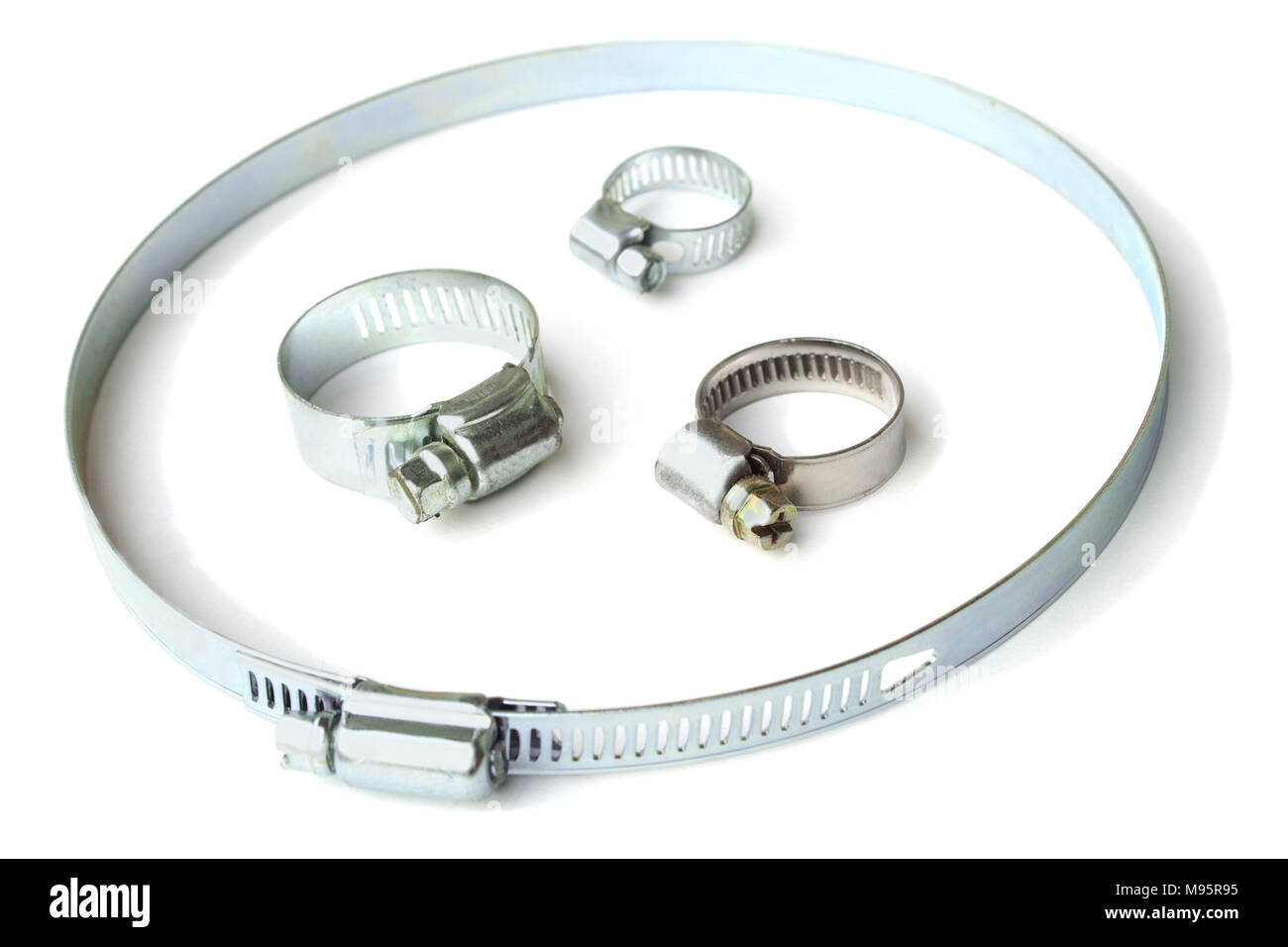 Metal clamps for construction purposes on a white Stock Photo - Alamy