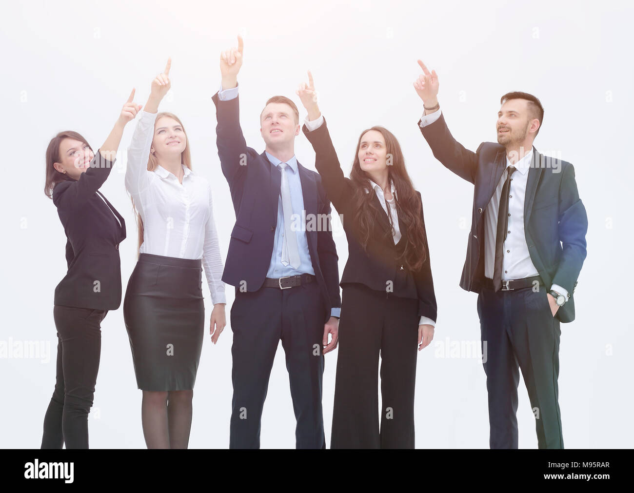business team pointing hands forward Stock Photo - Alamy