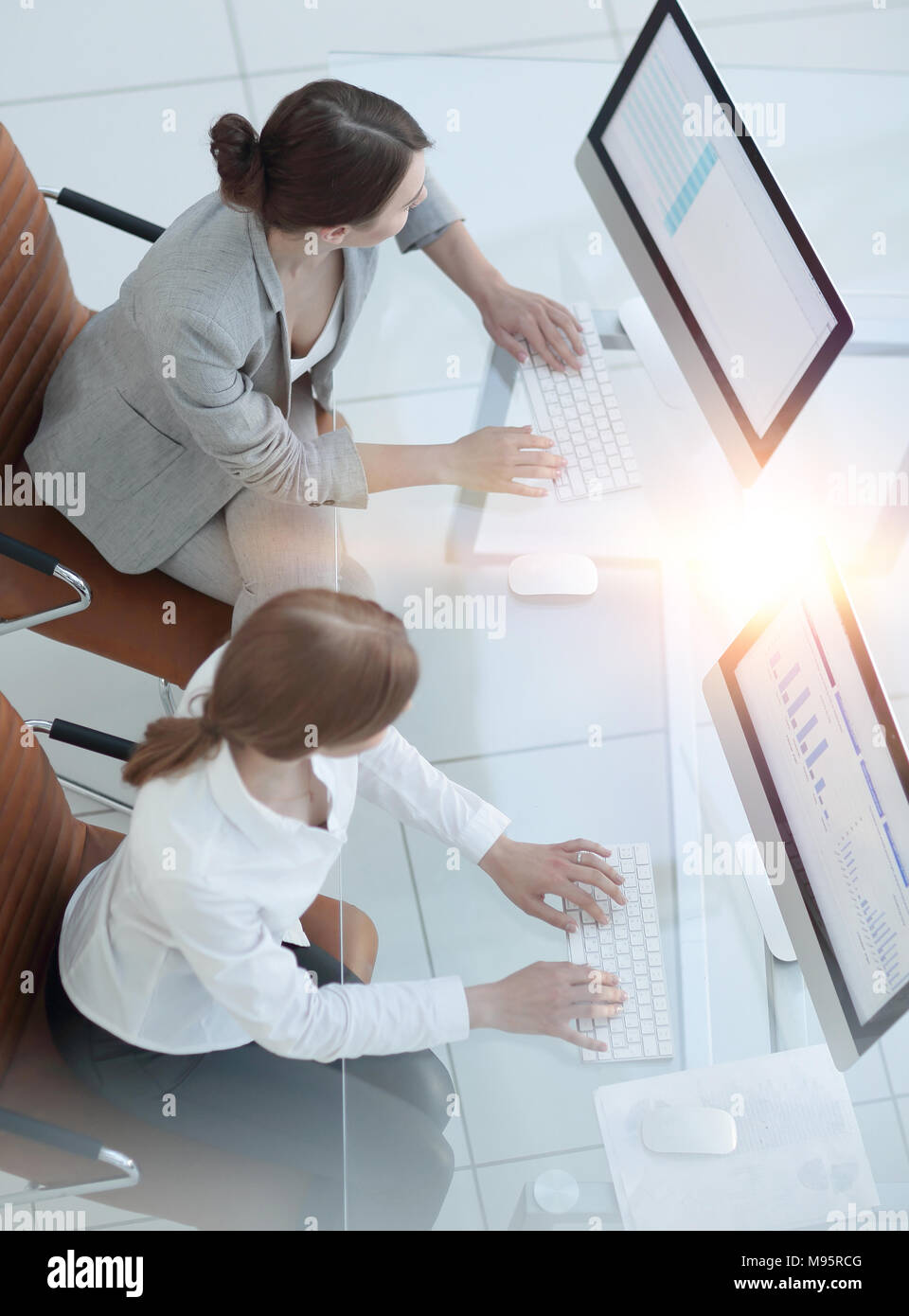 staff of the planning Department sitting behind a Desk Stock Photo - Alamy