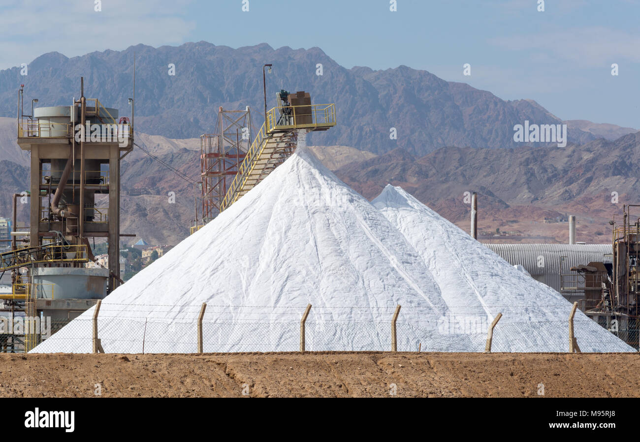 White pyramids with natural organic sea salt, salt works on factory ...
